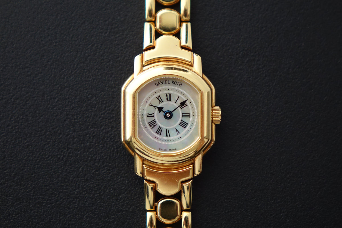 Daniel roth ladies mop dial gold bracelet watch only – Wristime