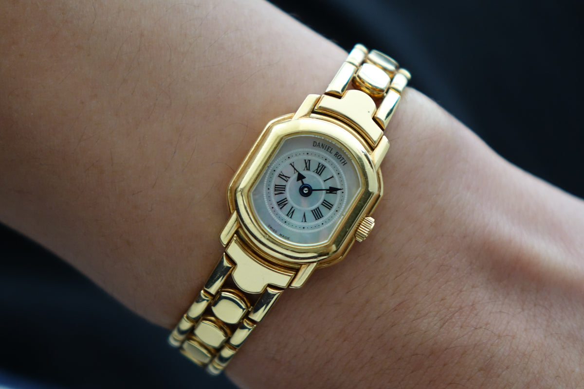 Daniel roth ladies mop dial gold bracelet watch only – Wristime